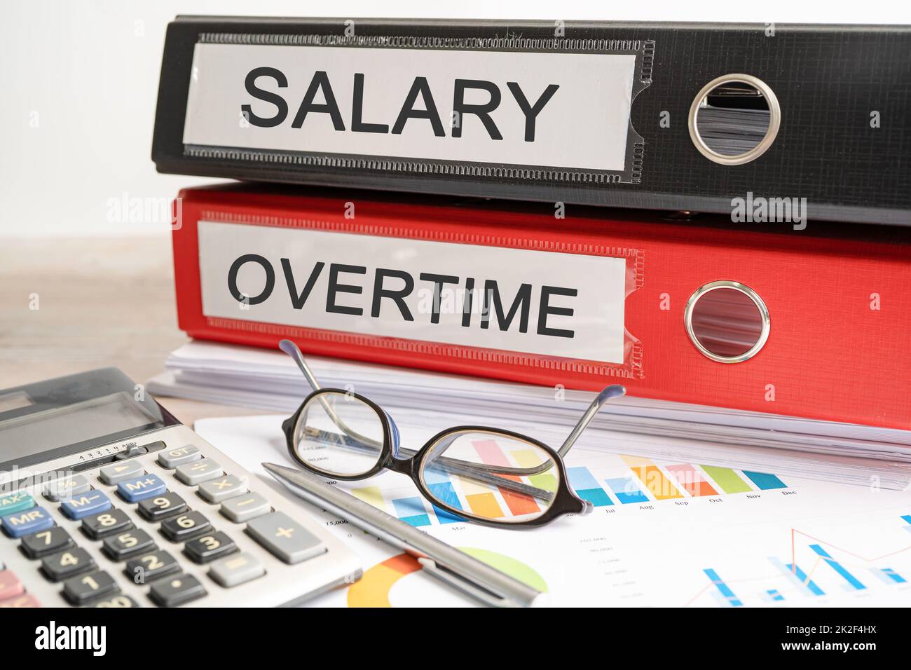 Salary overtime. Binder data finance report business with graph ...