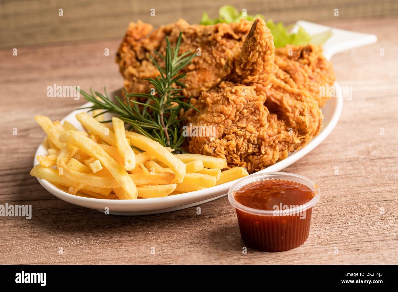 Fried chicken and potato chip with rosemary leaf, Junk food high ...