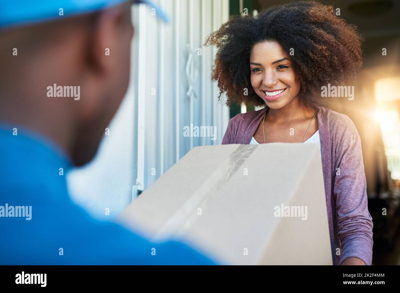 Female postal worker hi-res stock photography and images - Alamy