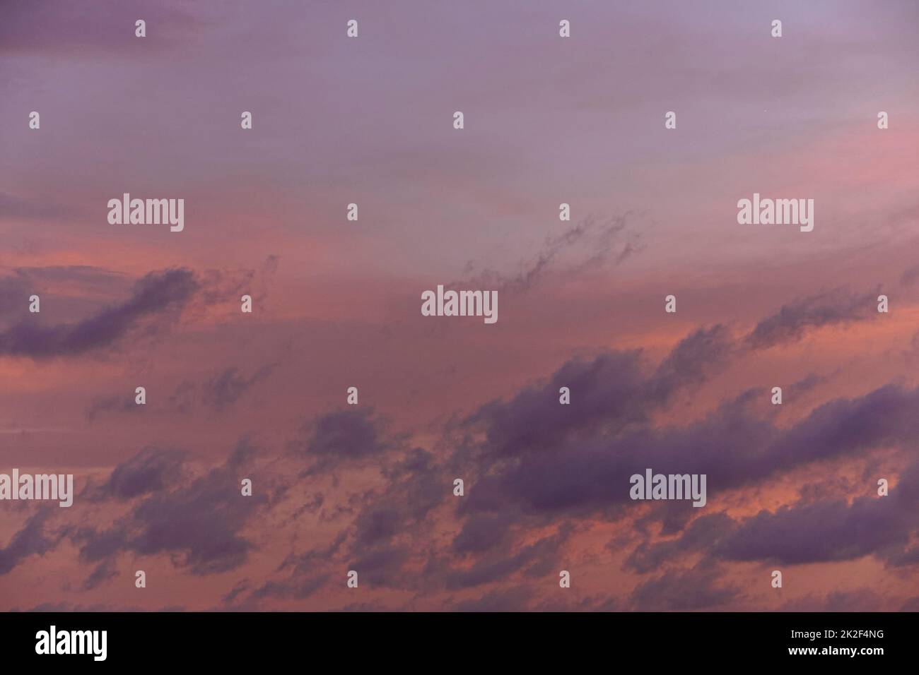 Sky light after sunset. orange background, clouds Stock Photo - Alamy