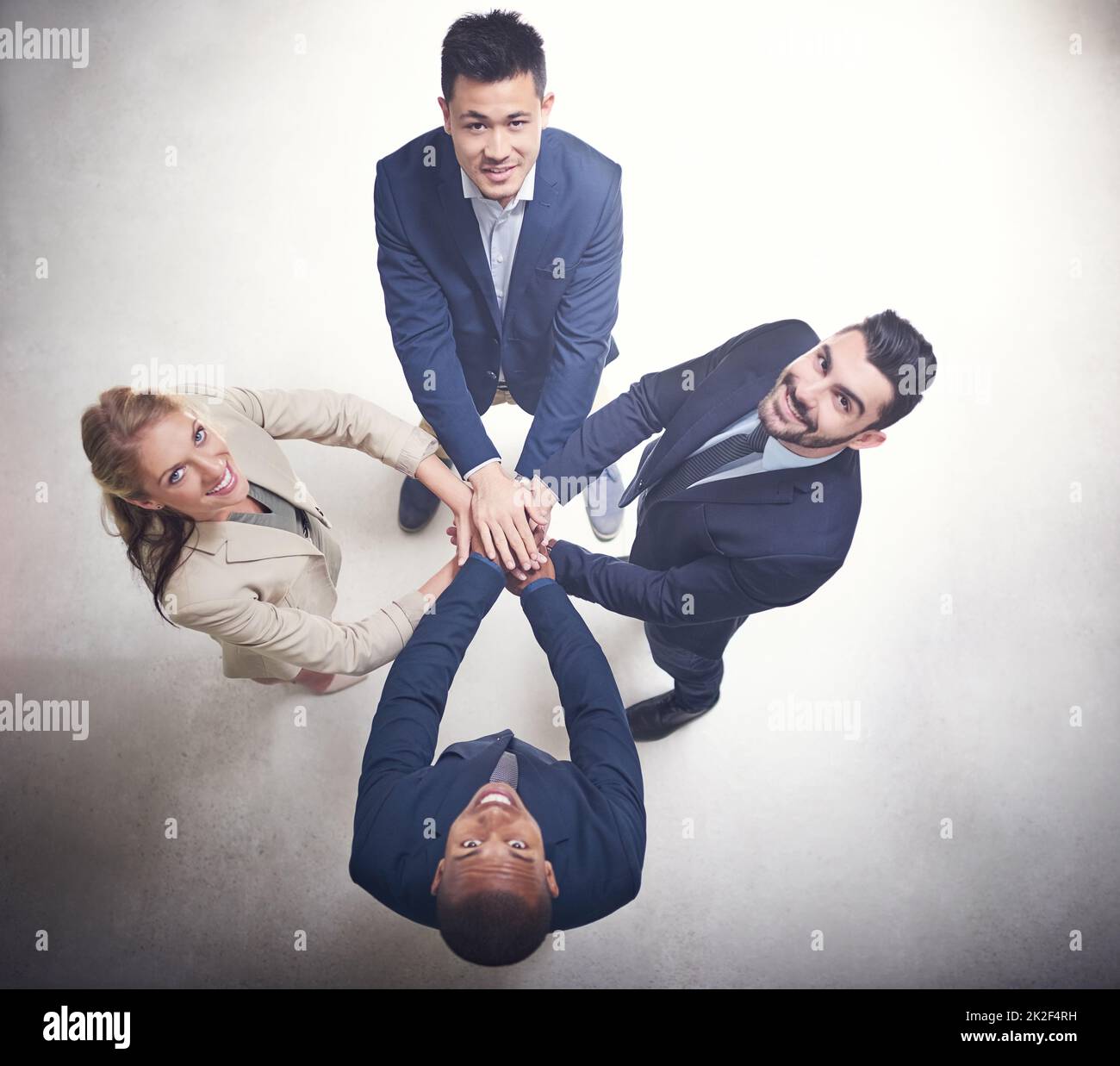 We know where our strength lies. High angle shot of a team of happy ...