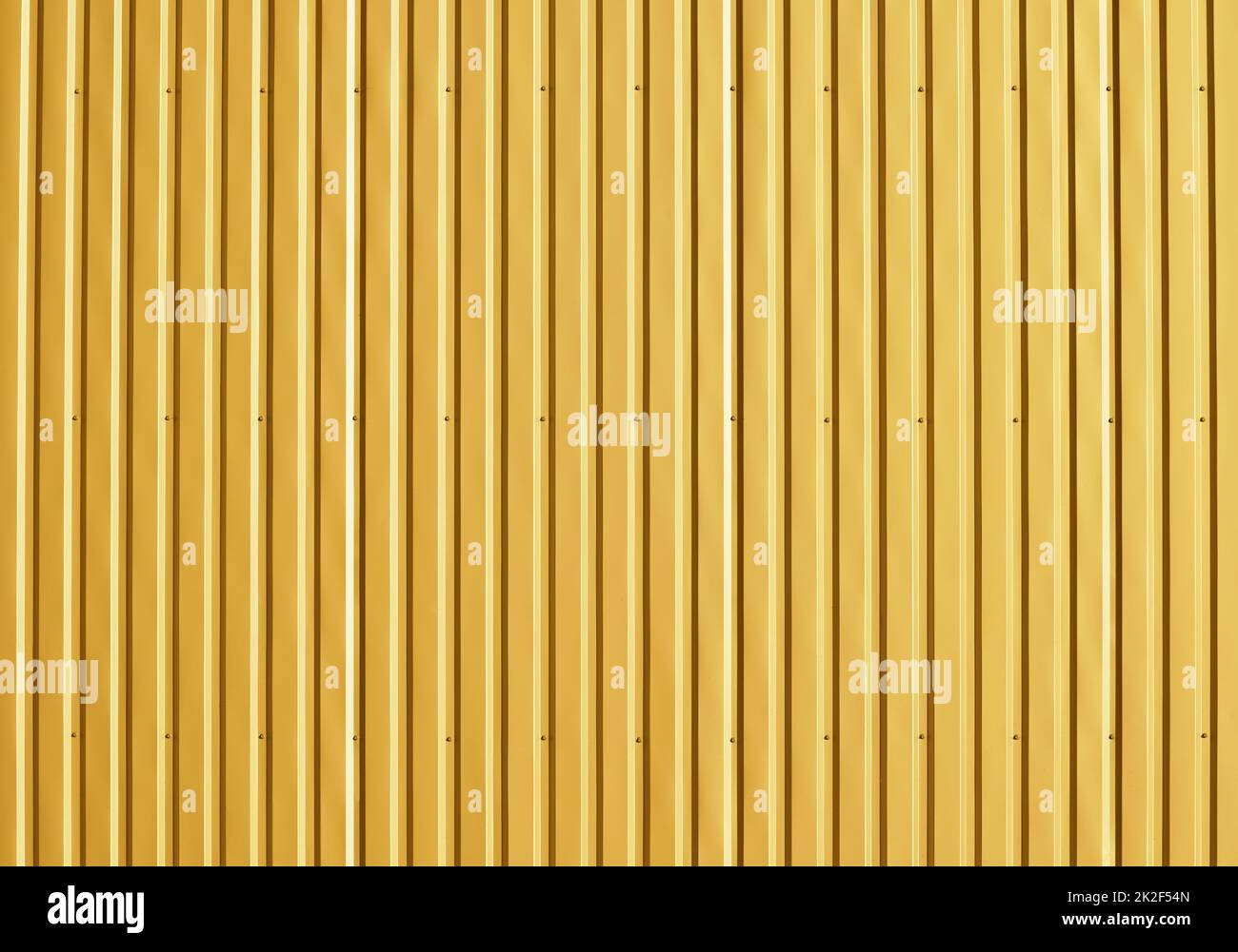 Golden aluminum corrugated metal wall Stock Photo - Alamy