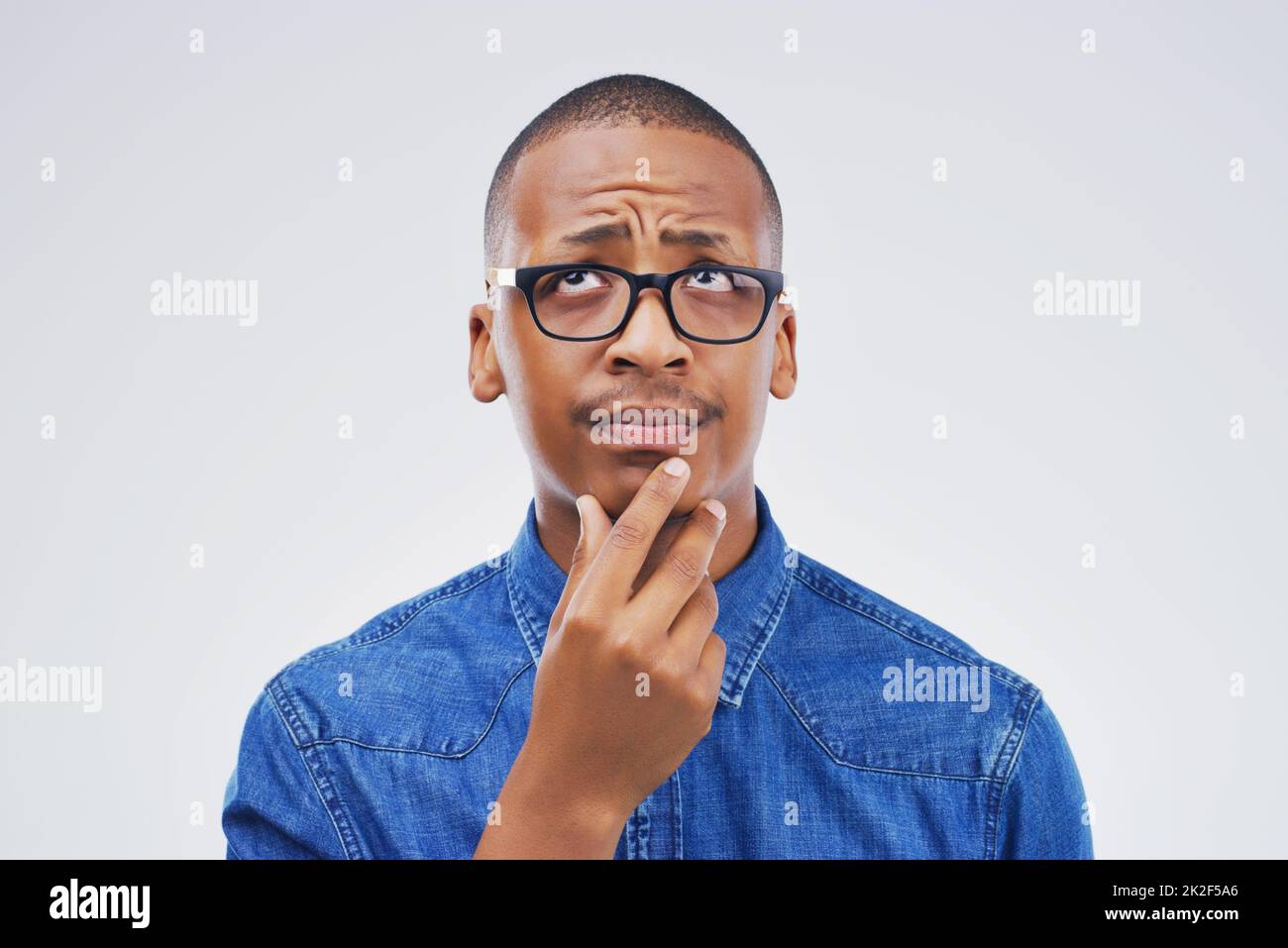 Young man in awkward pose hi-res stock photography and images - Alamy