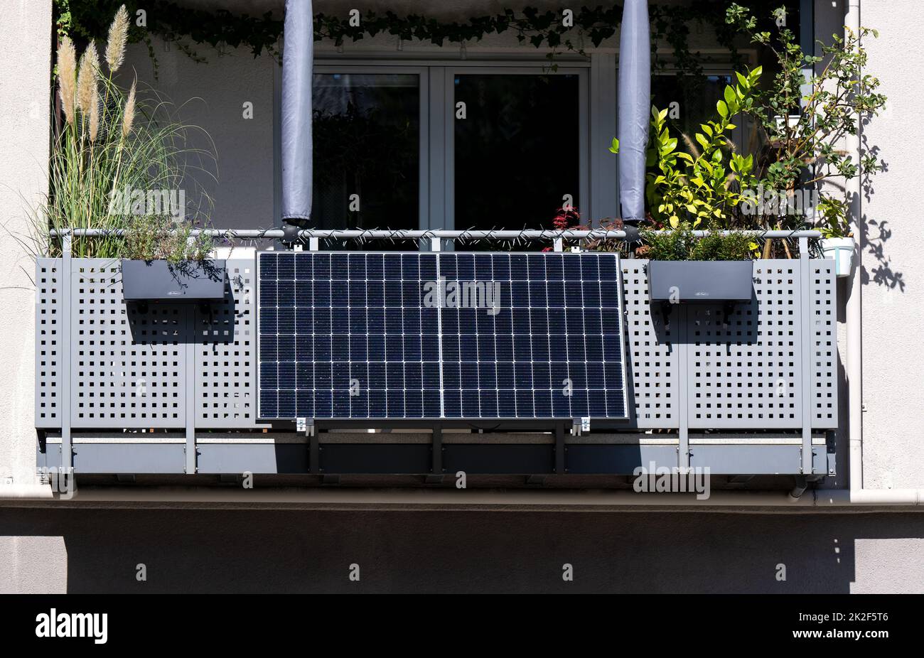 Munich, Germany. 22nd Sep, 2022. A small solar system is installed on a ...