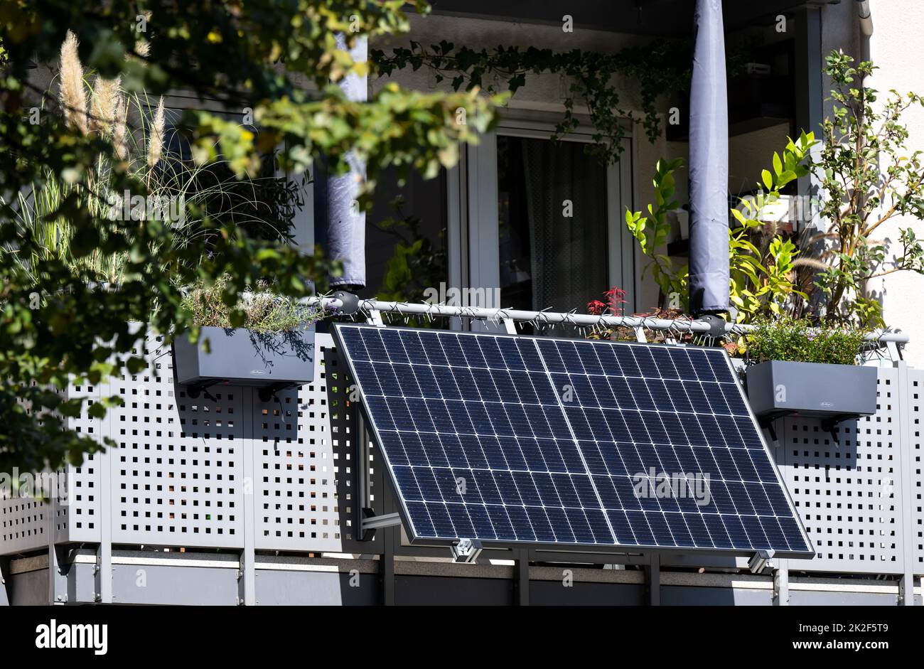 Munich, Germany. 22nd Sep, 2022. A small solar system is installed on a ...