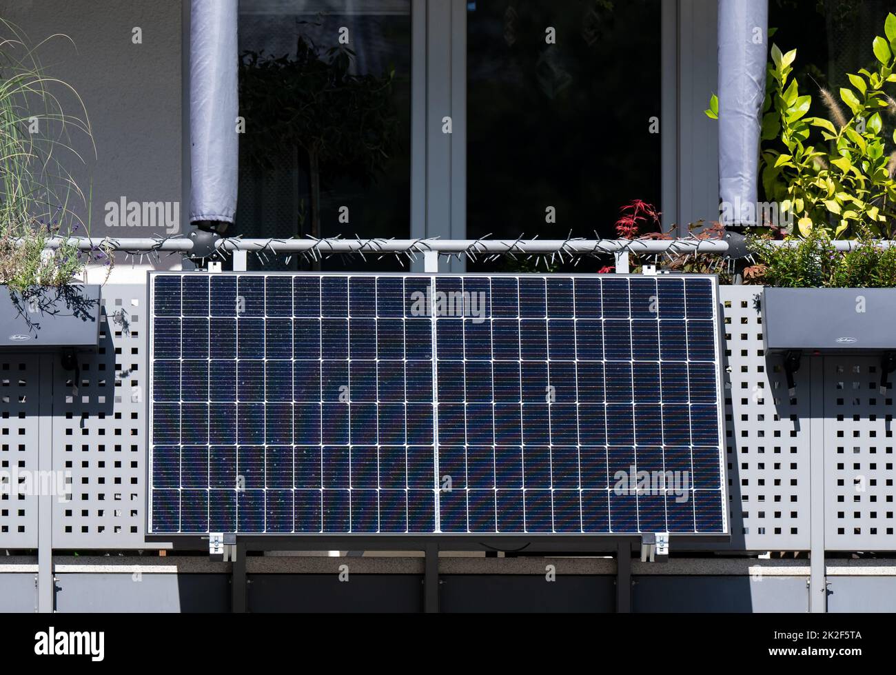 Munich, Germany. 22nd Sep, 2022. A small solar system is installed on a ...