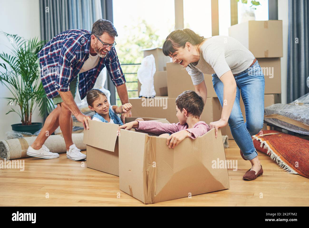 Family having fun indoors hi-res stock photography and images - Alamy