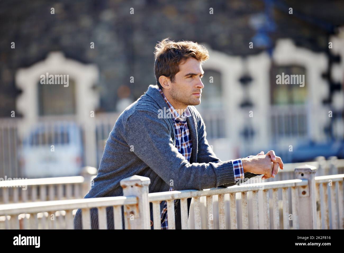 Leaning over railing hi-res stock photography and images - Alamy