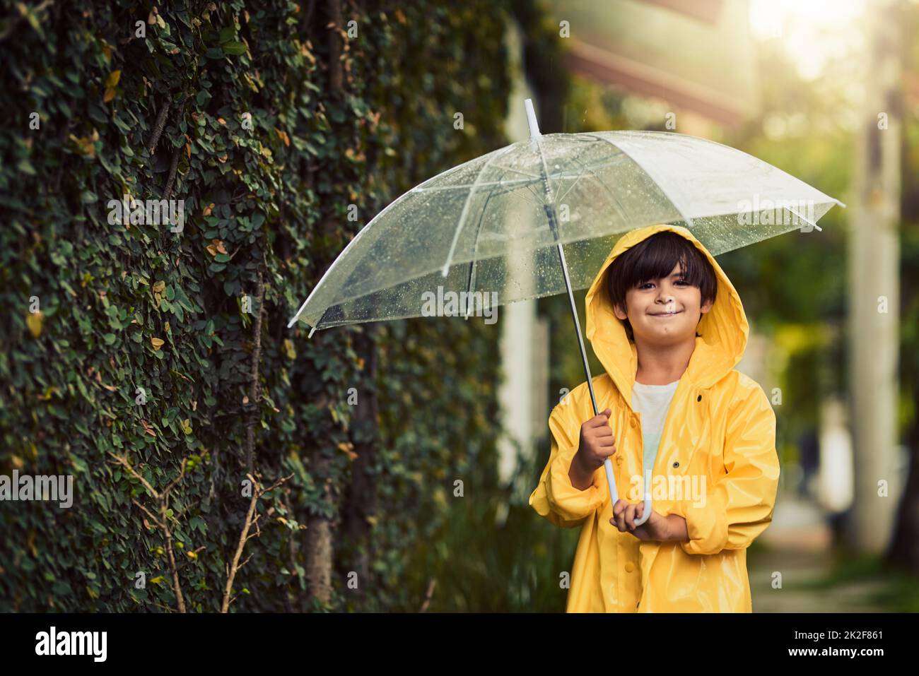 Boy in the rain hi-res stock photography and images - Alamy