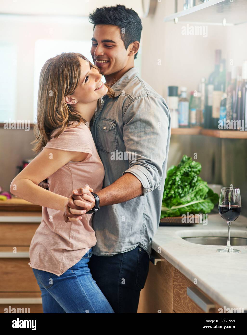 Couple dancing in the kitchen hi-res stock photography and images - Alamy