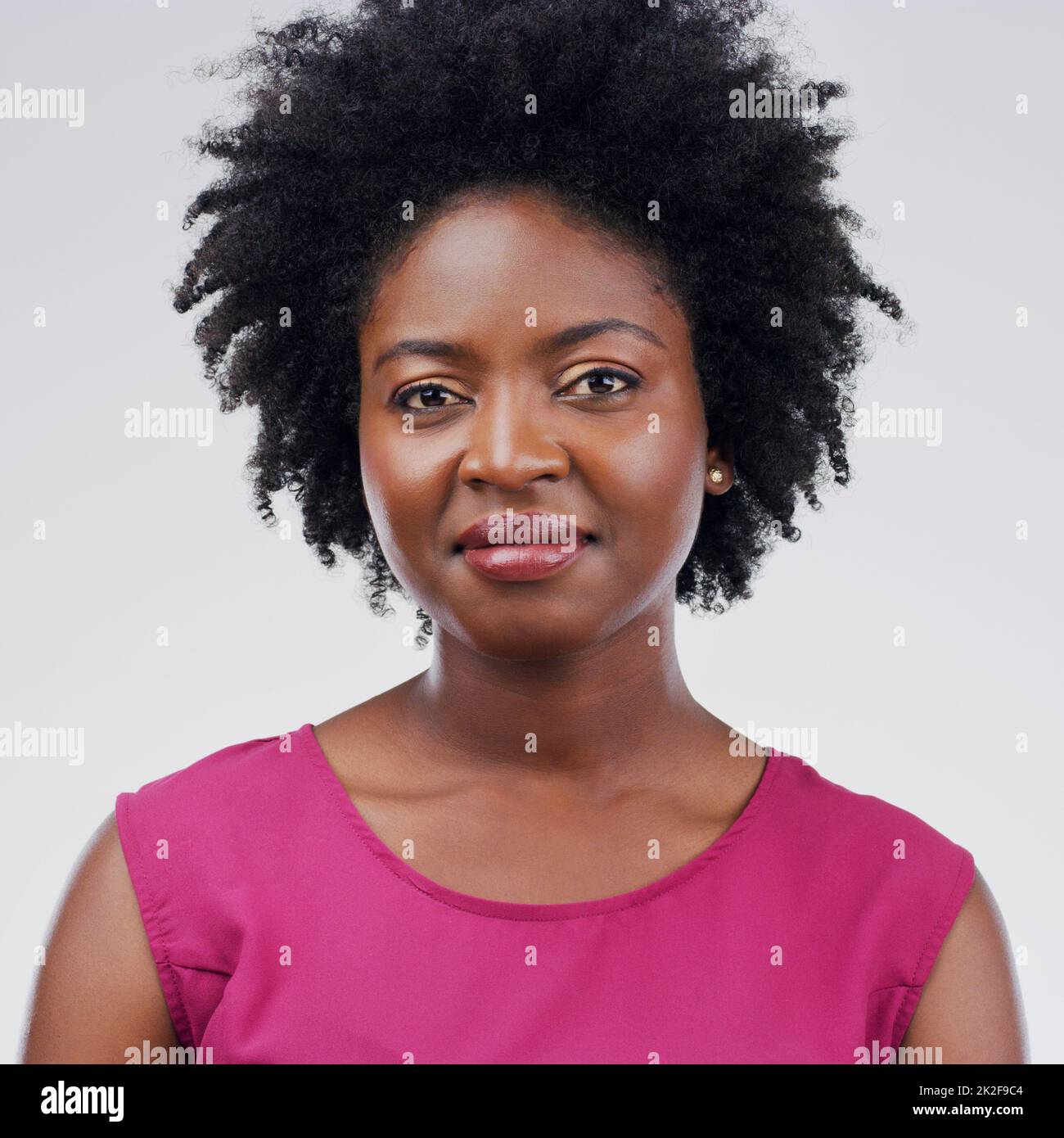 Dont think youll get a read on me. Studio portrait of an attractive ...