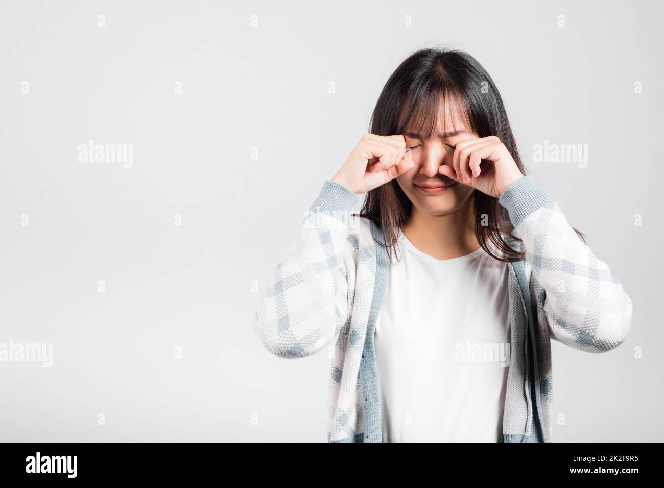 Unhappy woman bad mood her cry wipe tears with fingers Stock Photo - Alamy