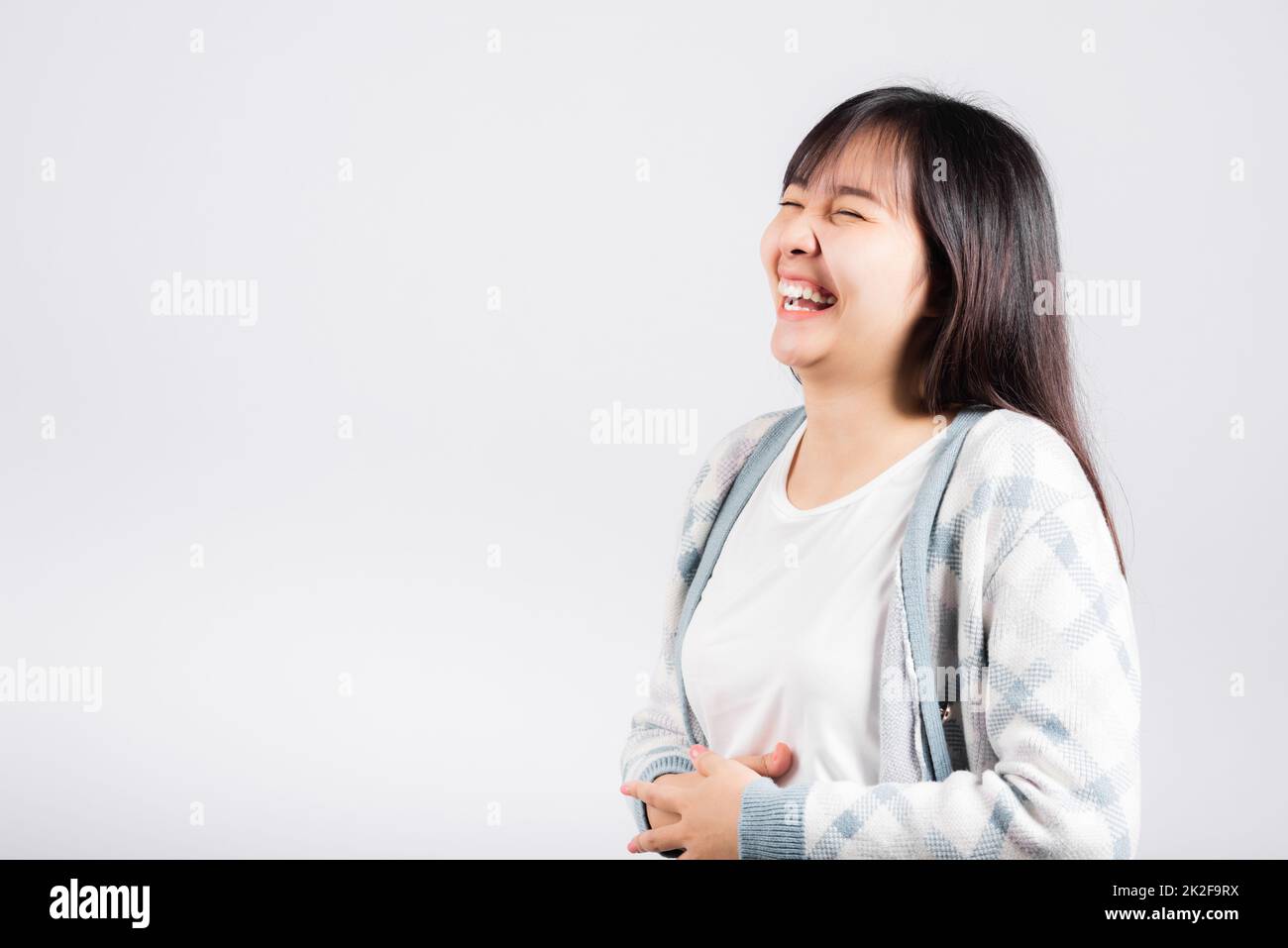 Woman winning and surprised excited screaming laughing Stock Photo - Alamy