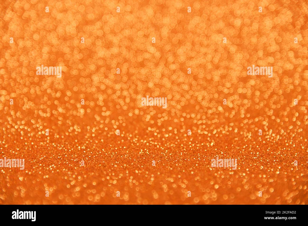 Orange glitter background hi-res stock photography and images - Alamy