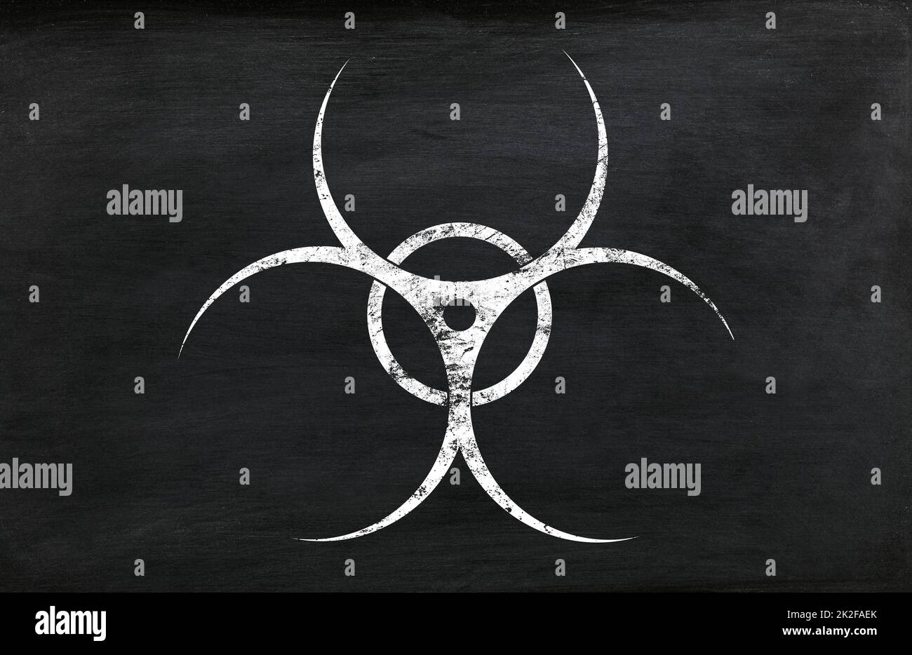 White biohazard sign over black background Stock Photo - Alamy