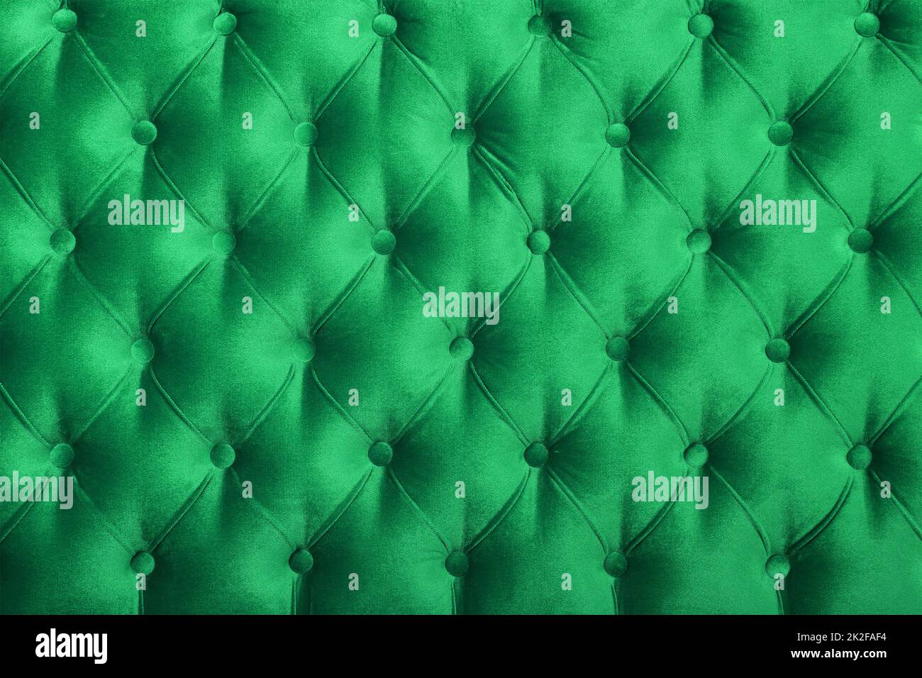 Green capitone tufted fabric upholstery texture Stock Photo - Alamy