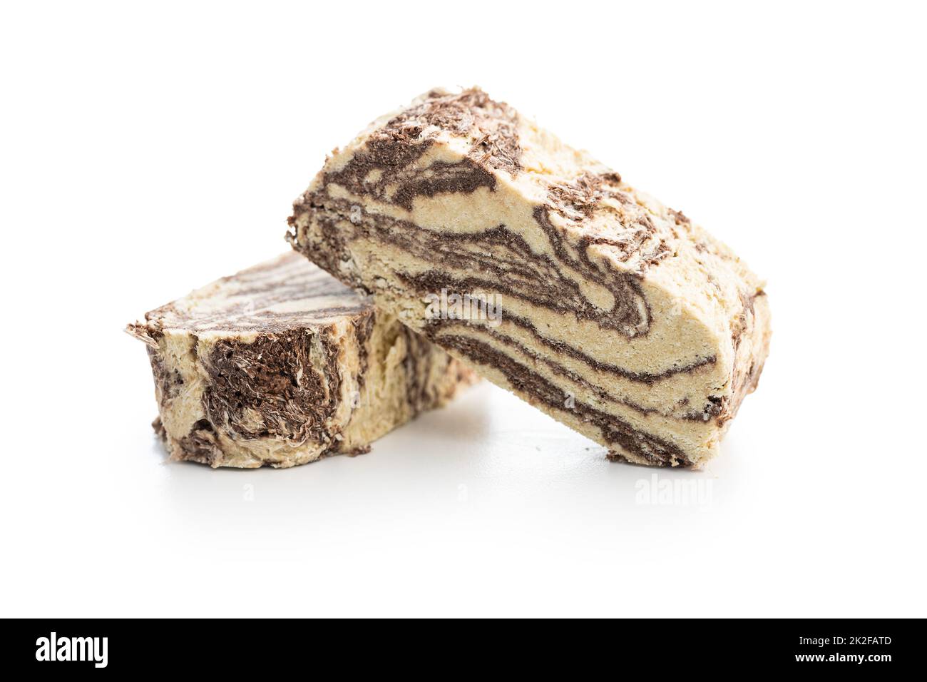 Sweet tahini halva with cocoa flavor . Turkish dessert isolated on ...