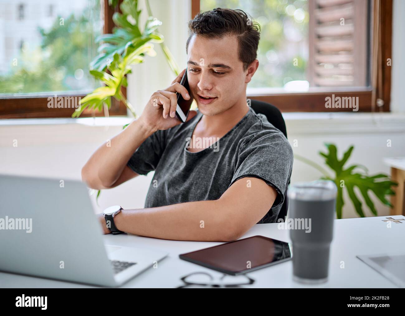 Staying focused and on track with his tasks. Shot of a young ...