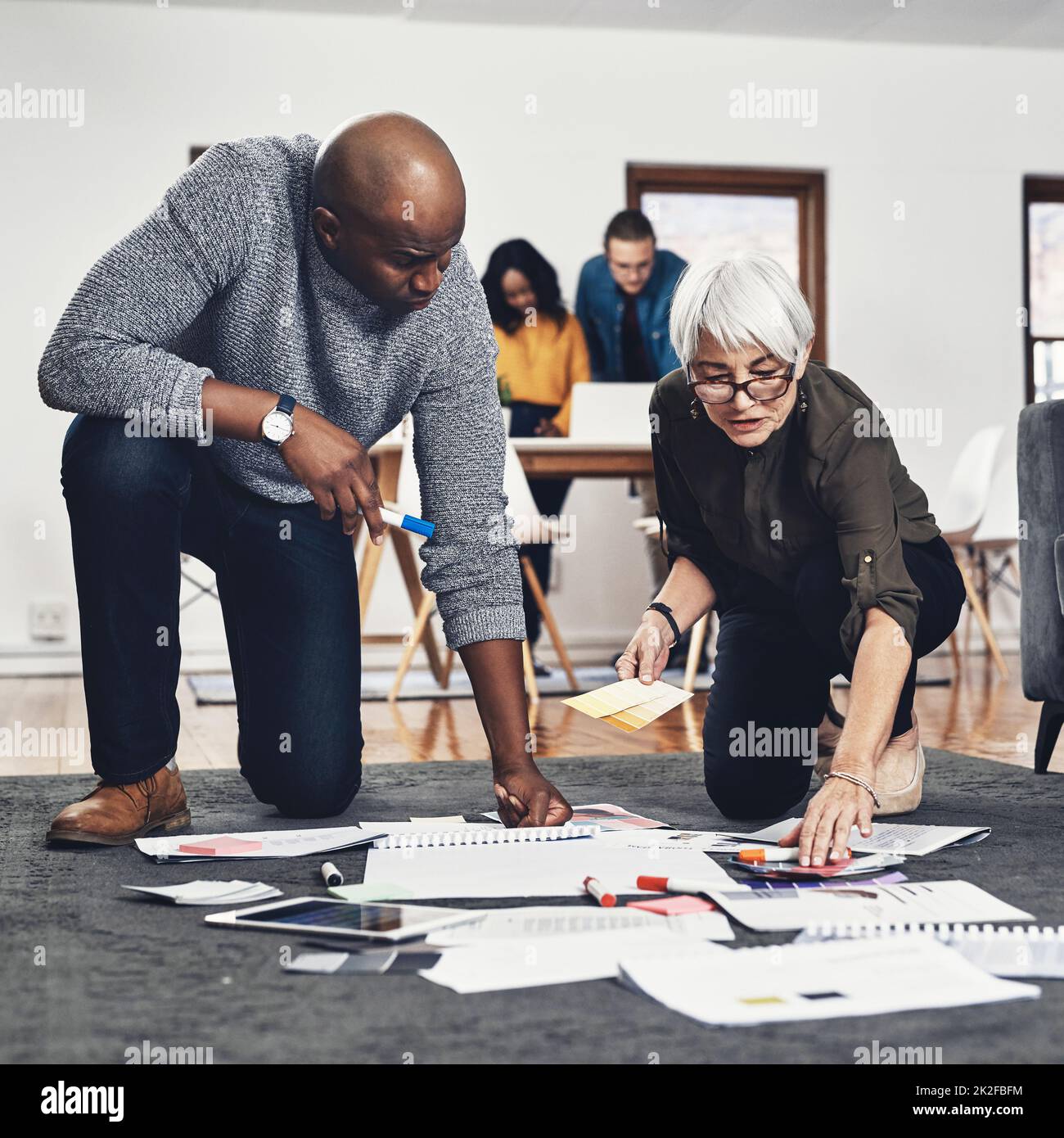 This method might just work. Full length shot of two businesspeople ...