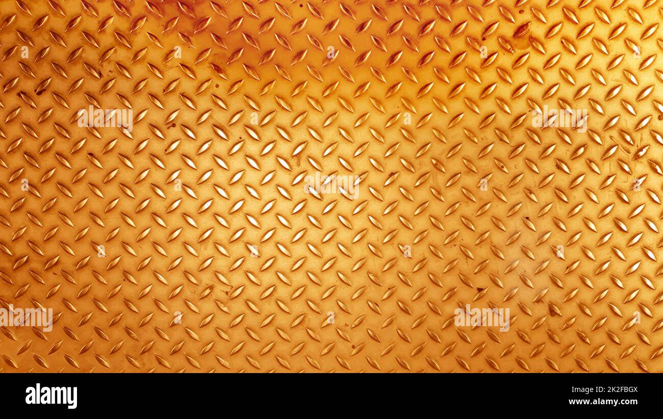 Gold diamond plate Stock Photo - Alamy