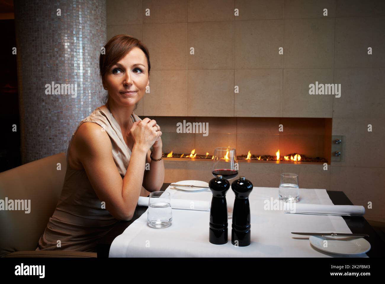Woman eating alone in luxury restaurant hi-res stock photography and ...