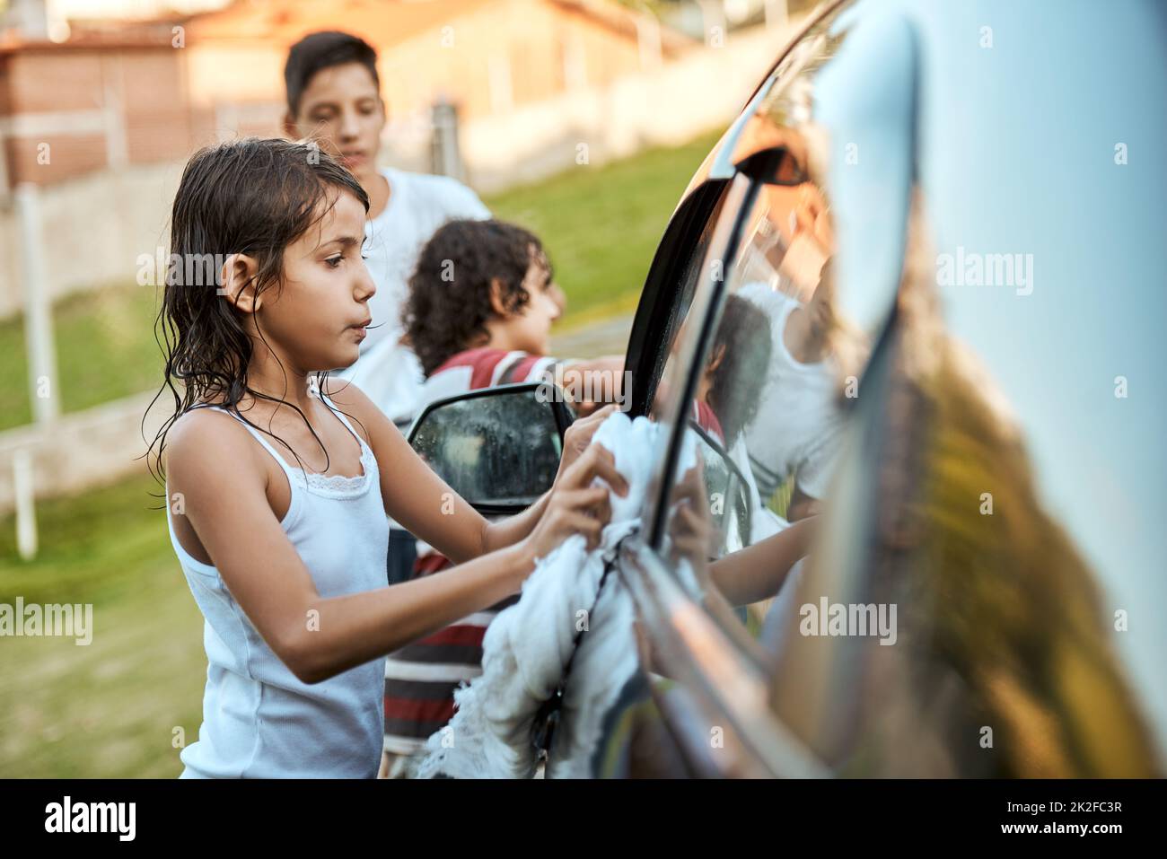 Kids washing car hi-res stock photography and images - Alamy