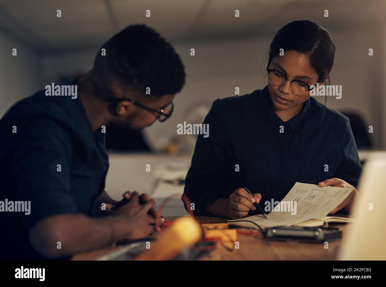 247 expertise for all of your tech needs. Shot of two young technicians ...