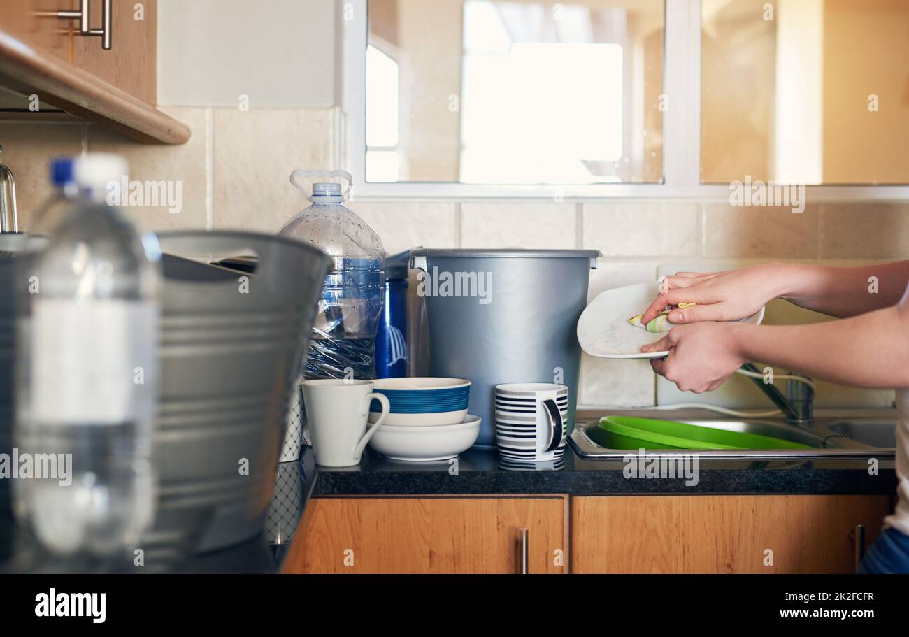 Another great way to save water. Cropped shot of an unrecognizable ...