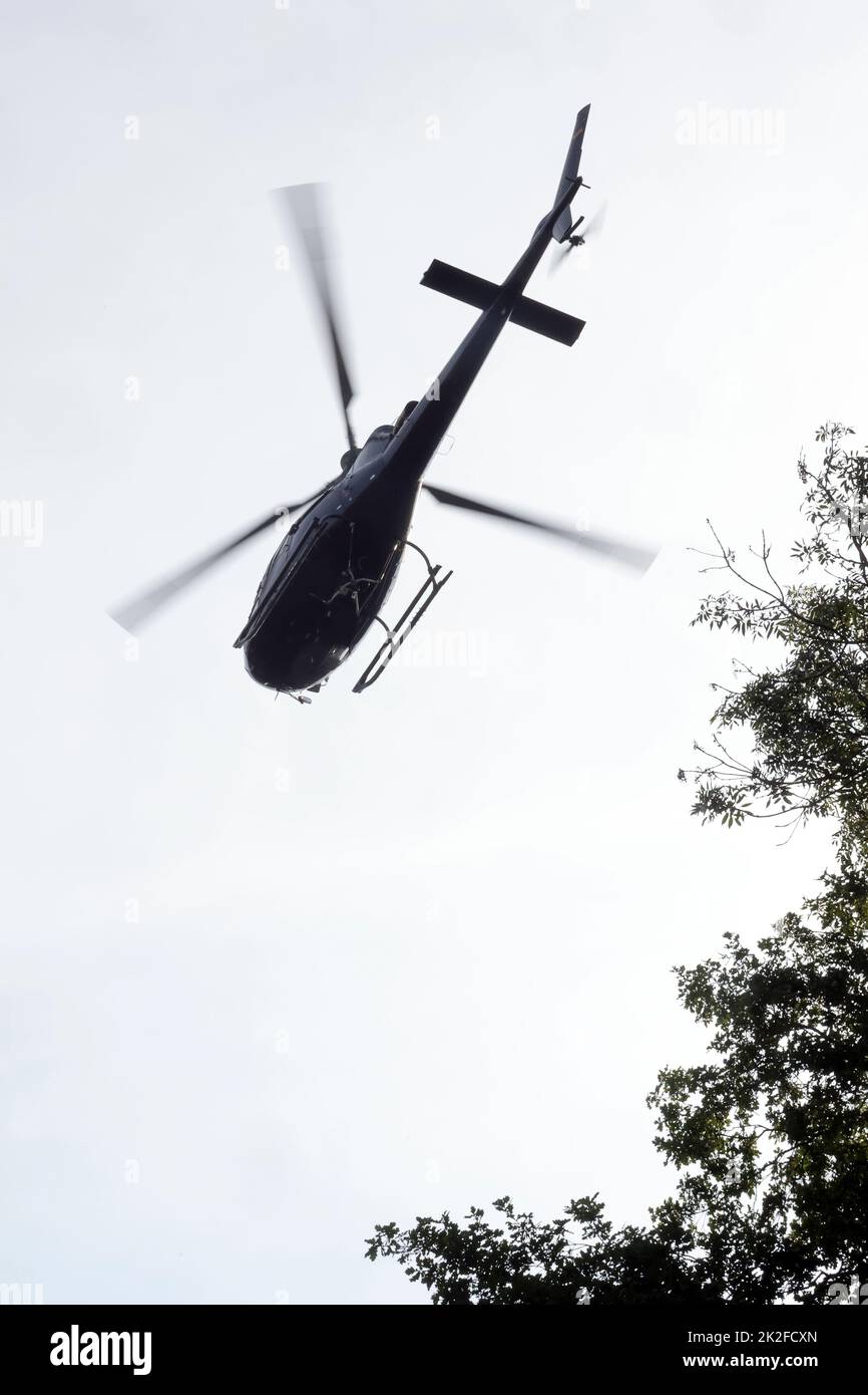 helicopter flight, flying helicopter Stock Photo - Alamy