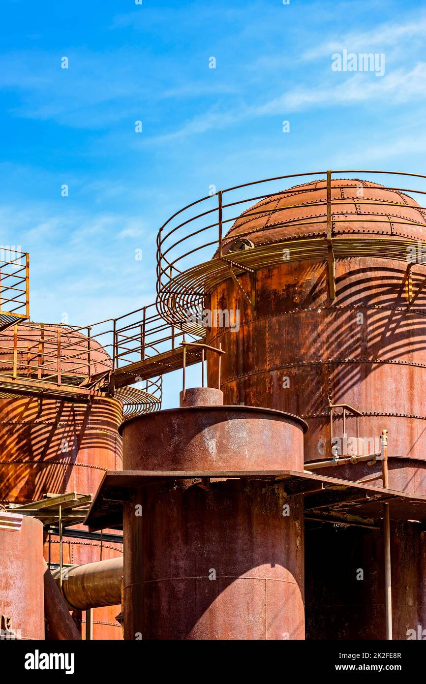 Old machinery tanks and infrastructure Stock Photo - Alamy
