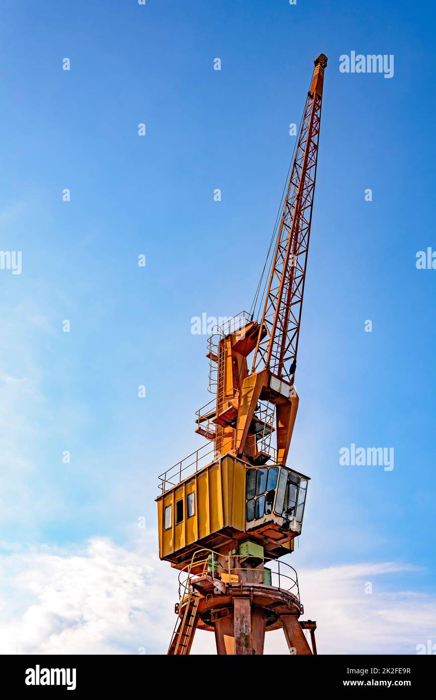 Old, obsolete and rusty crane Stock Photo - Alamy