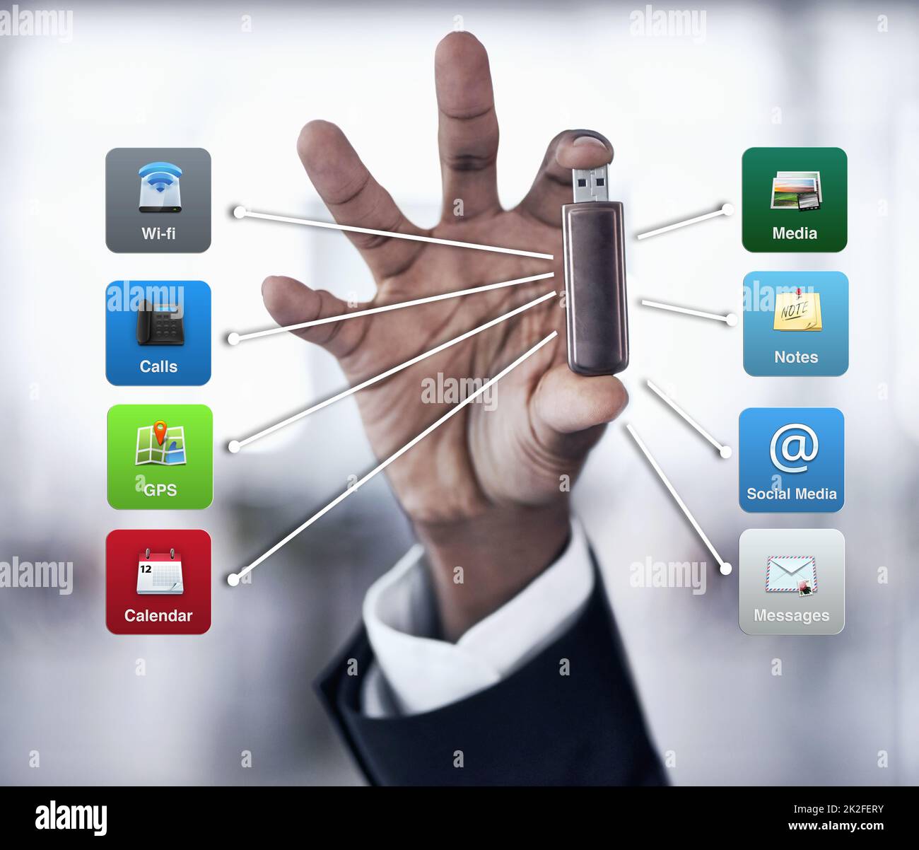 Important data on the move. an african businessman holding up a usb ...