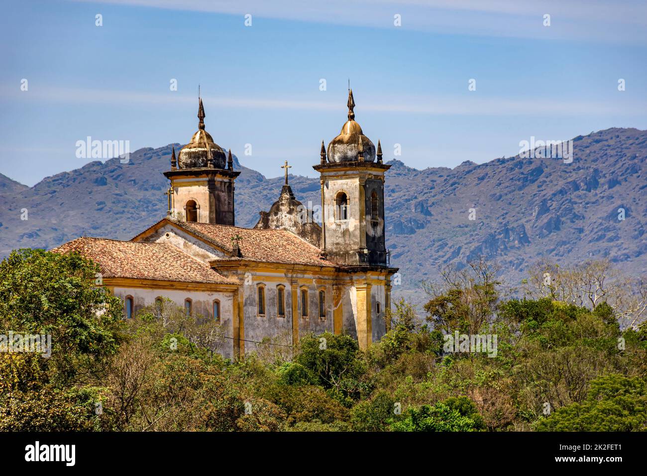 View from behind an old colonial-style church Stock Photo - Alamy