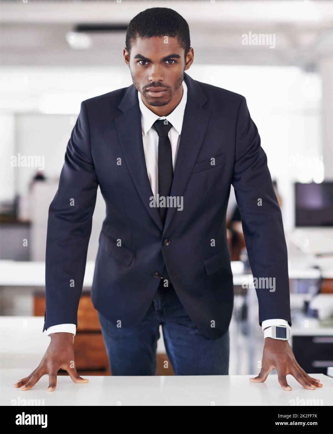 Man standing behind table hi-res stock photography and images - Alamy