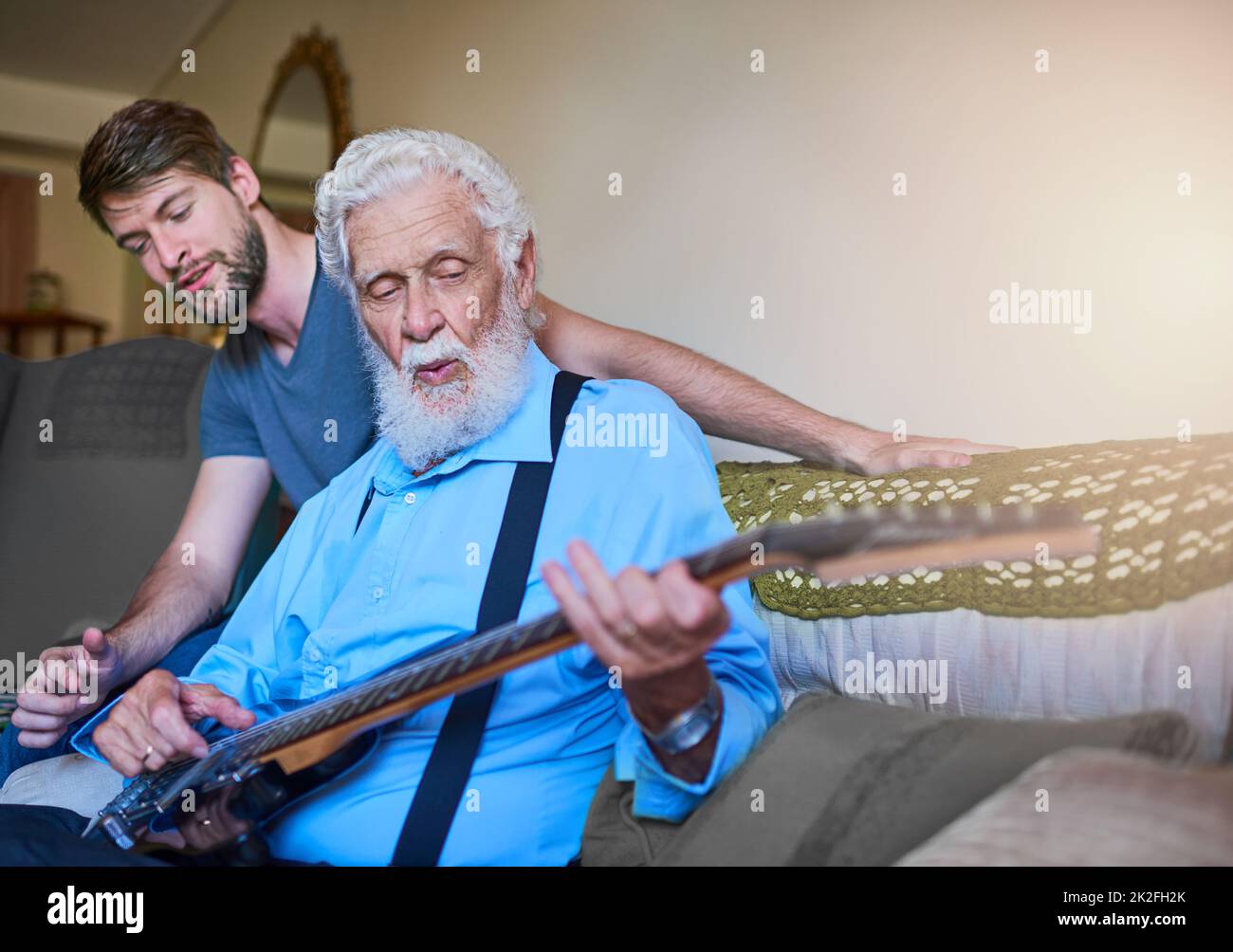 Youre Never Too Old To Become A Rockstar Shot Of A Happy Young Man