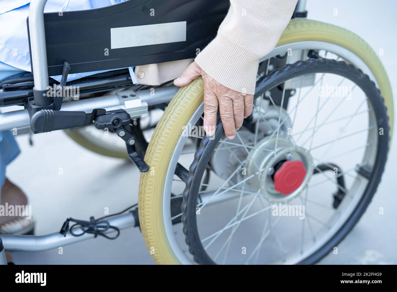 Asian senior or elderly old lady woman patient on electric wheelchair ...