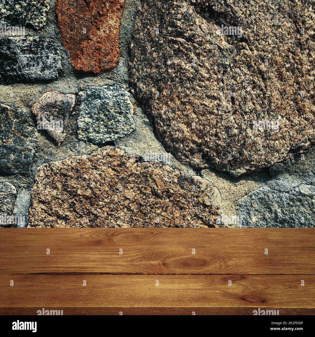 The background is blank wooden boards and a textured stone wall with ...