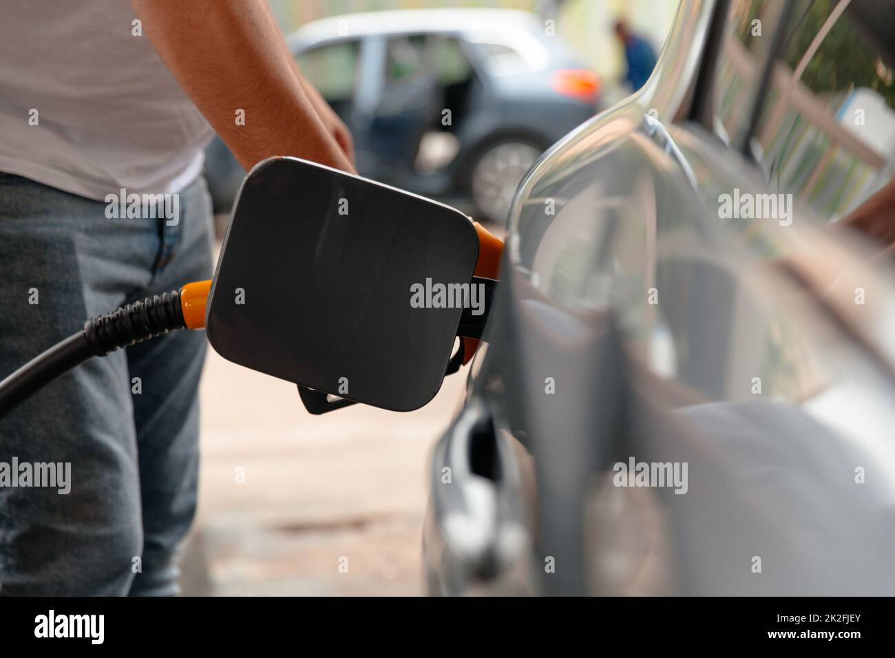 Refuel cars at the fuel pump Stock Photo - Alamy