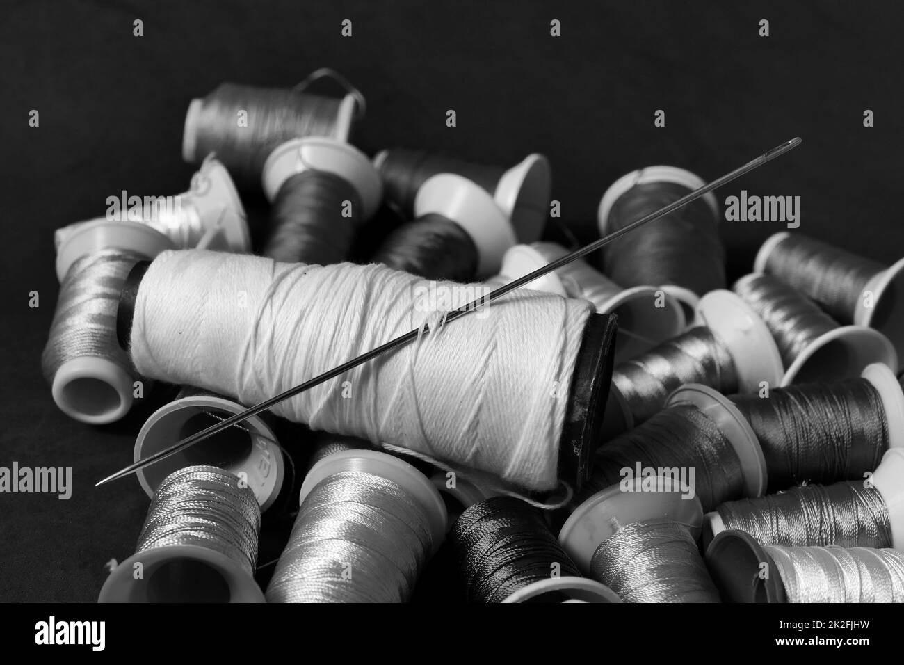 close-up of a tailor holding thick sewing thread and large needle,quilt ...