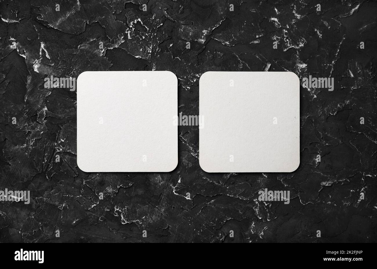 Two beer coasters Stock Photo - Alamy