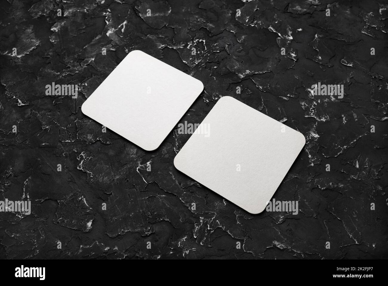 Square beer coasters Stock Photo - Alamy