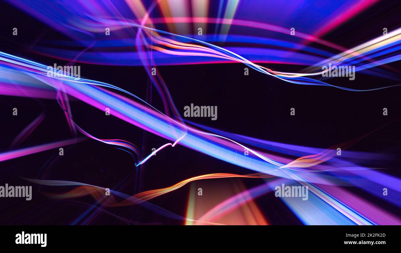 Colorful fiber strings in motion against black background Stock Photo ...