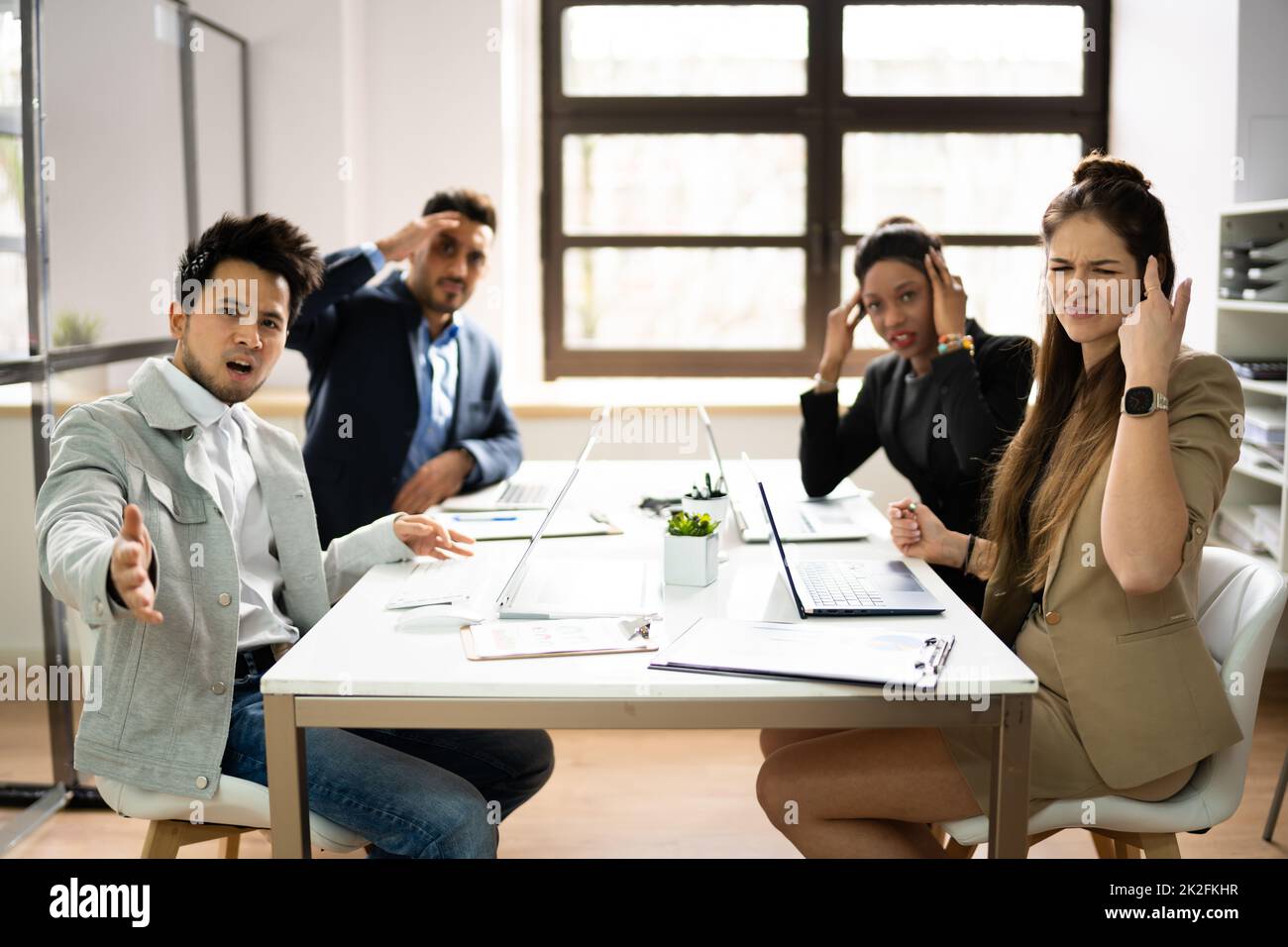 Angry Executives At Workplace Complaining Stock Photo - Alamy