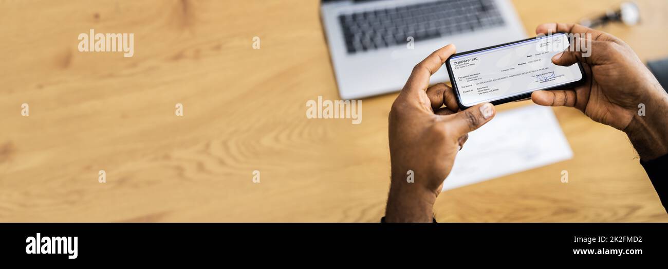 Remote Check Deposit Using Mobile Remote Stock Photo - Alamy