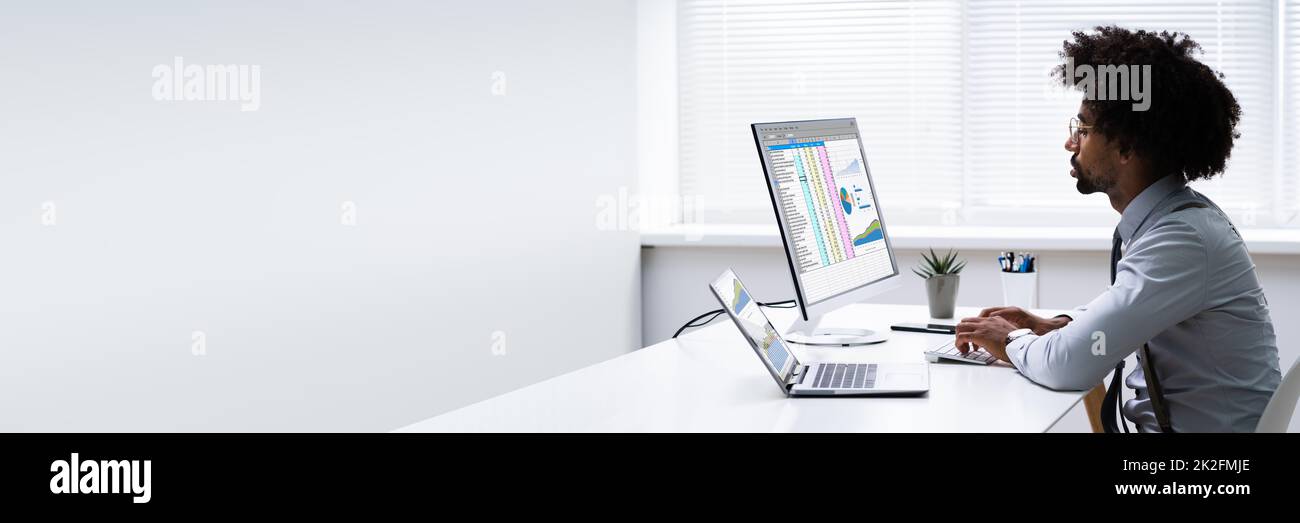 Analyst Employee Working With Spreadsheet Stock Photo - Alamy