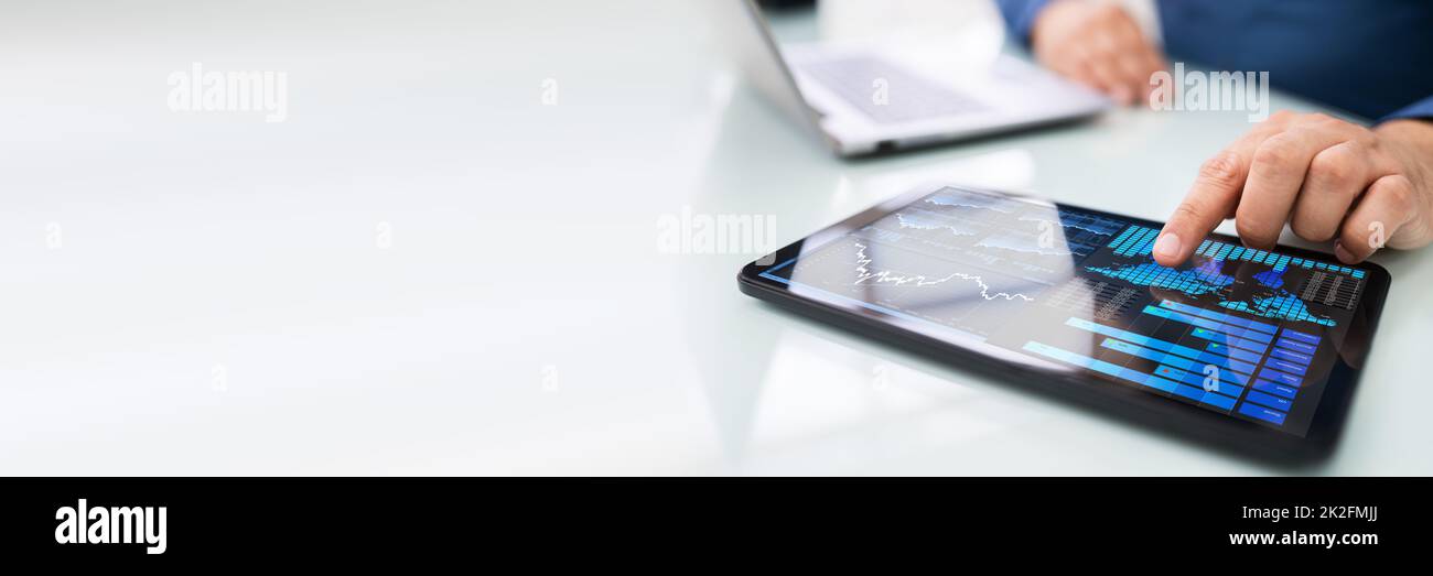 Person's Hand Pointing On Graph At Tablet Stock Photo - Alamy