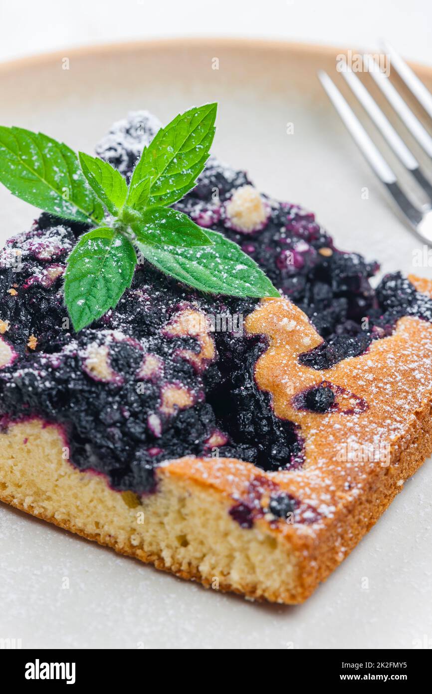 piece of blueberry cake with mint Stock Photo - Alamy