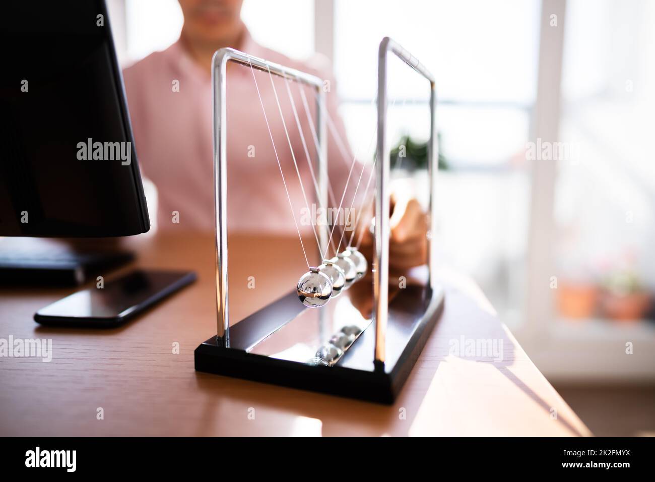 Pendulum Action Movement And Science Stock Photo - Alamy