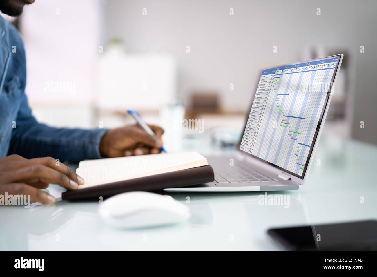 Analyst Employee Working With Spreadsheet Stock Photo - Alamy