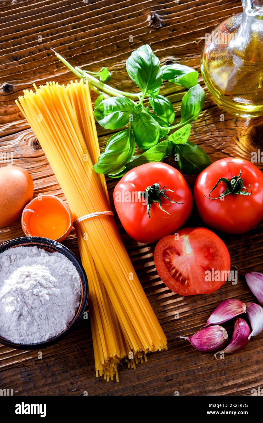 Composition with dried spaghetti, and pasta ingredients Stock Photo - Alamy